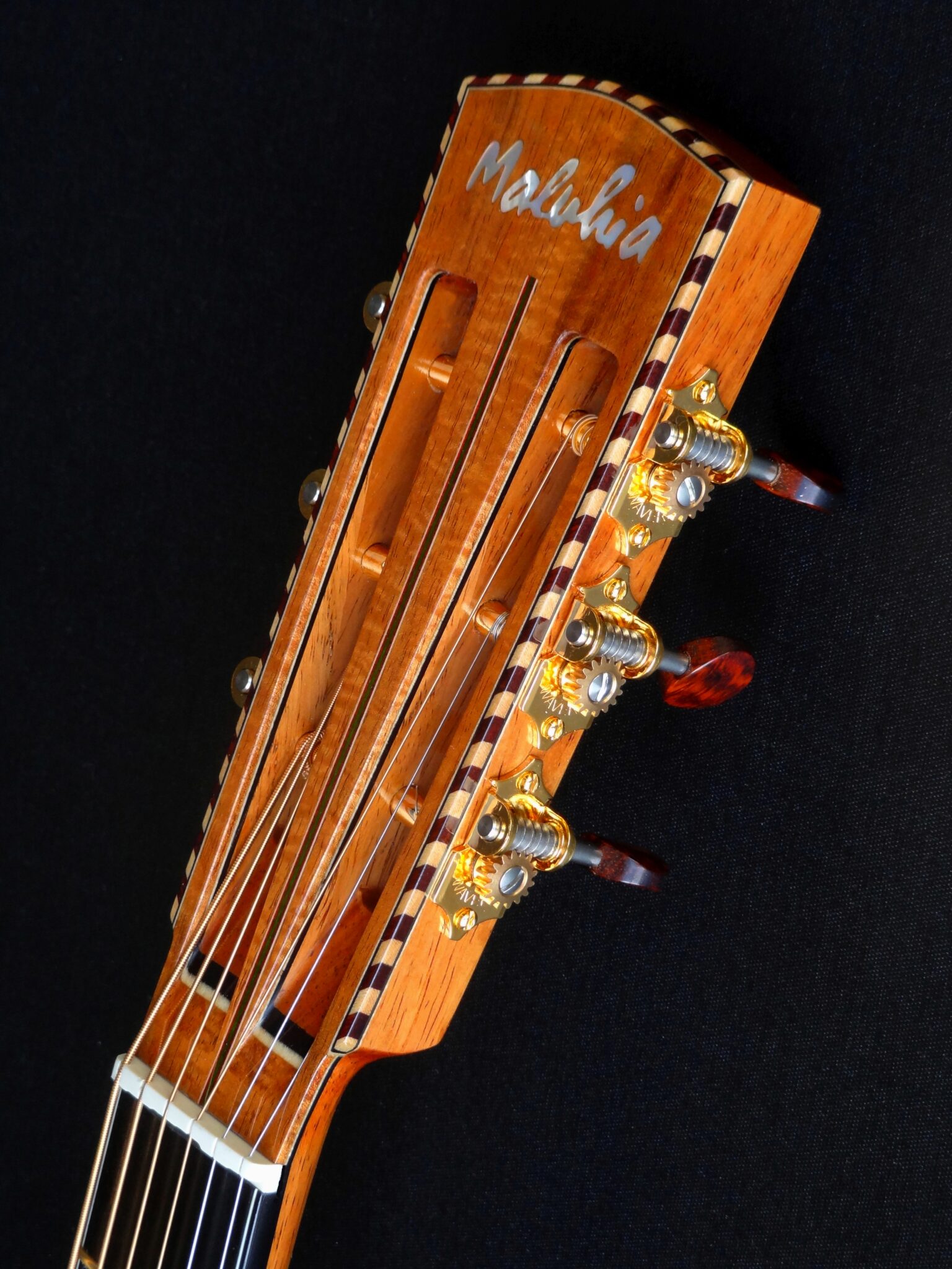 Inlaid headstock of koa guitar with rope binding - Gore Guitars ...
